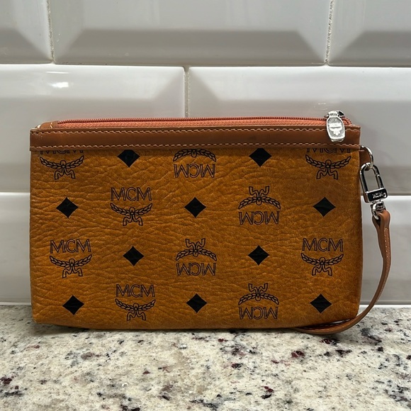MCM | Bags | Mcm Brown Leather Pouch Euc | Poshmark